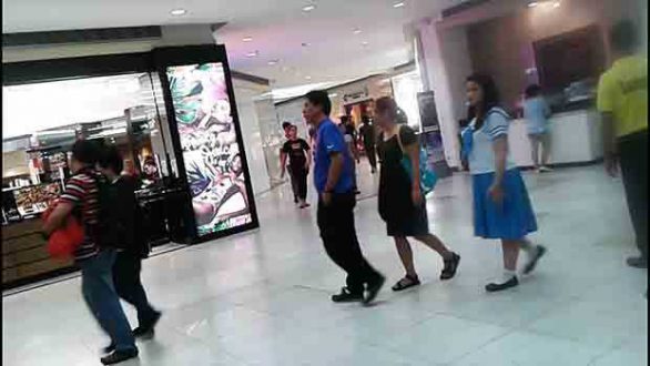 Watch busy foot traffic on mall hallway intersection - CB360